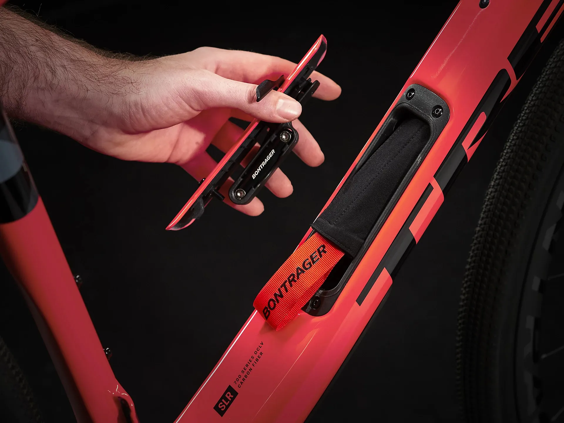 TREK Checkpoint SLR 6 AXS Gravel Bike in Radioactive Coral