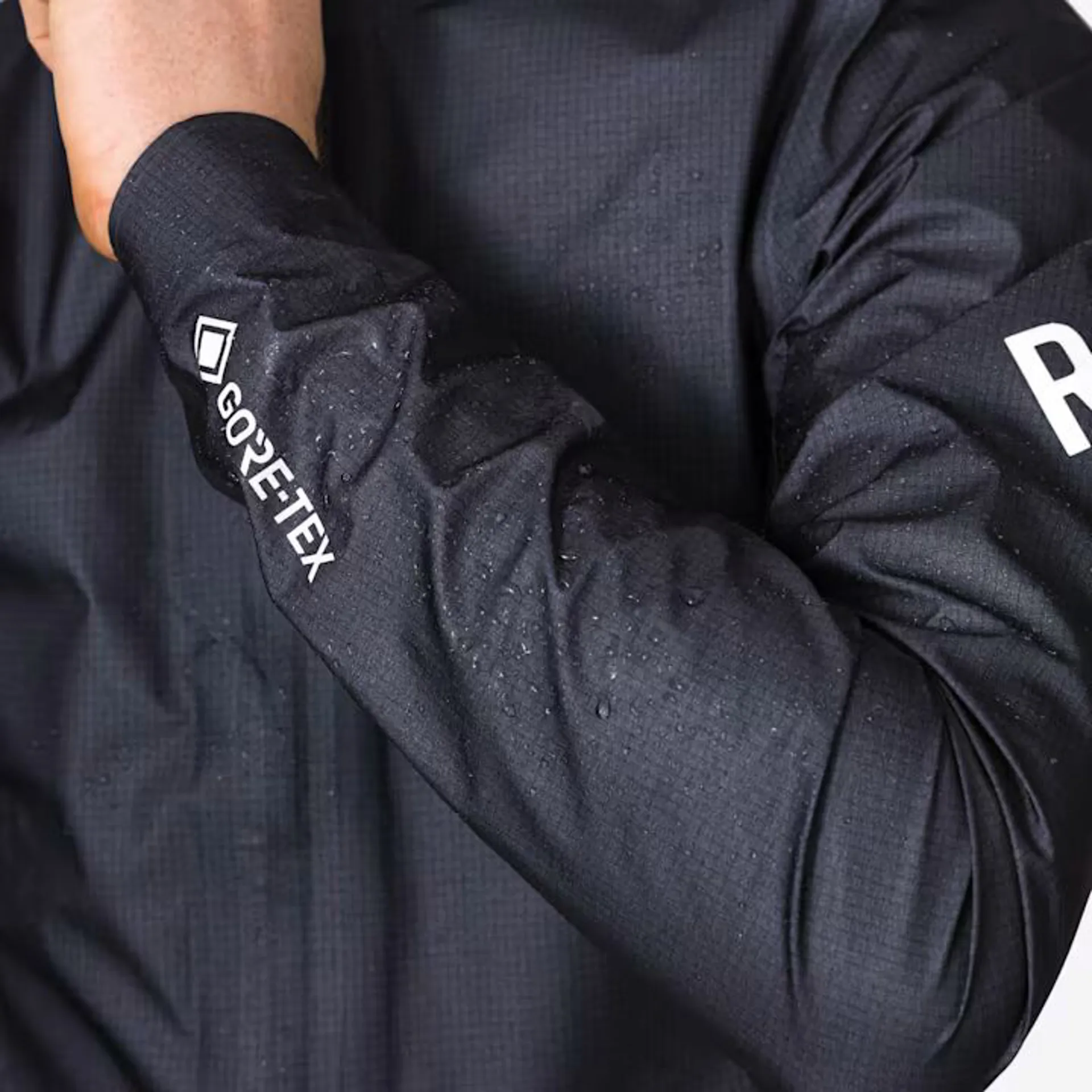 Rapha Mens Pro Team Gore Tex Lightweight Rain Jacket in Black Charcoal
